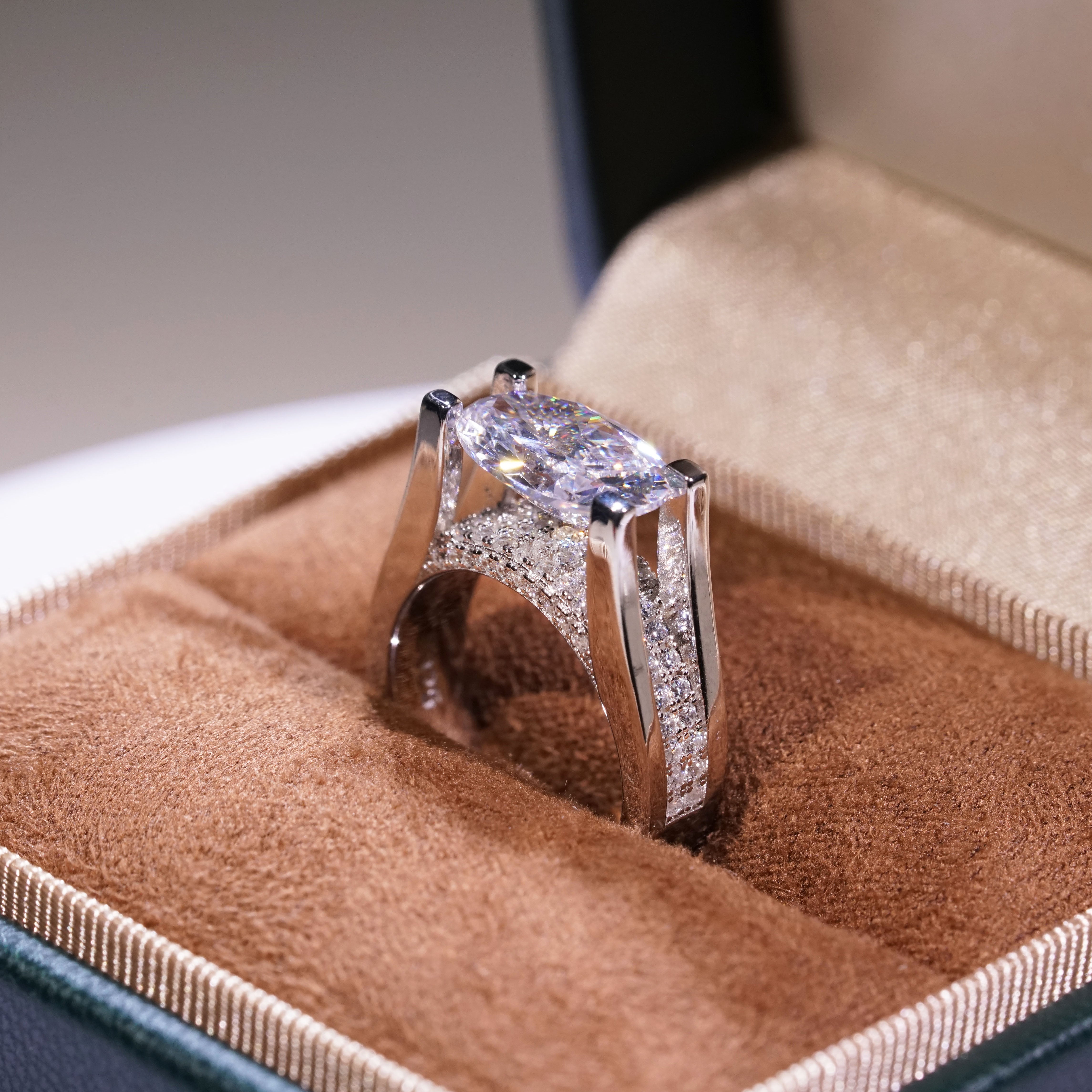 Oval Cut Inverted Tension-set Engagement Ring in Sterling Silver ...